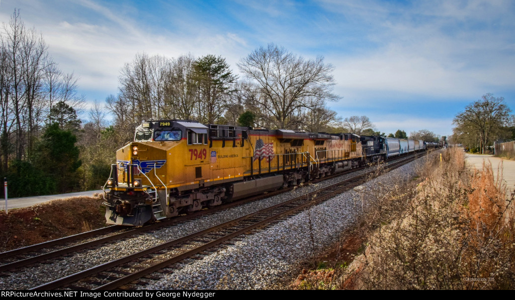 An NS mixed freight train with 2 UP engines leading